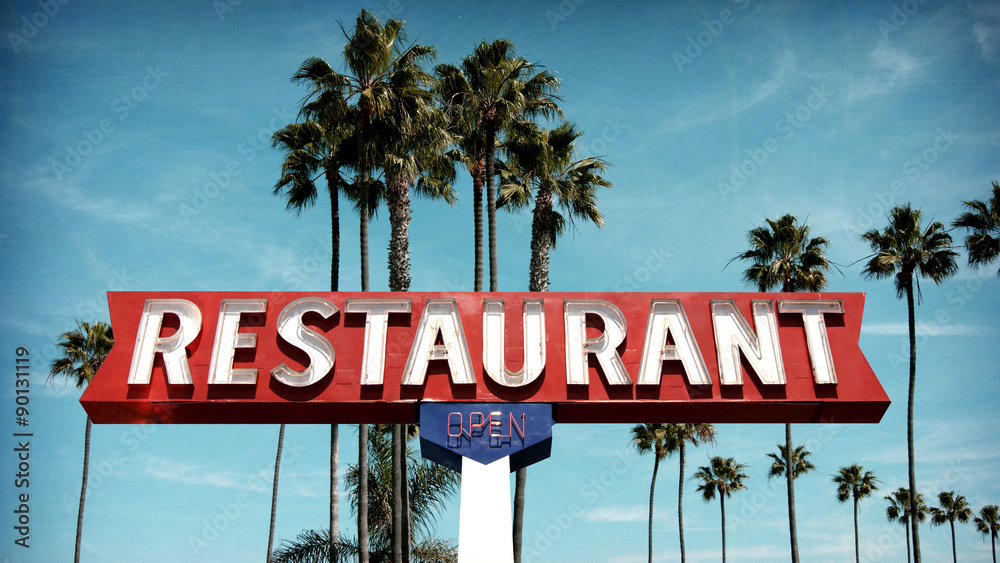 aged and worn vintage photo of neon restaurant sign with palm trees ...