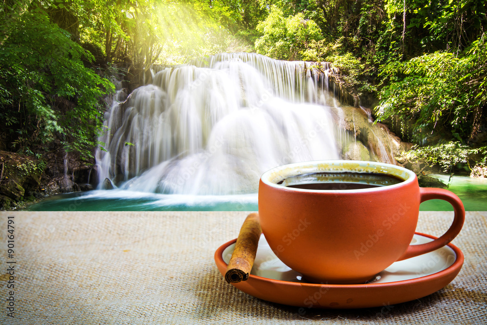 Espresso coffee cup on the table with waterfall Stock Photo | Adobe Stock