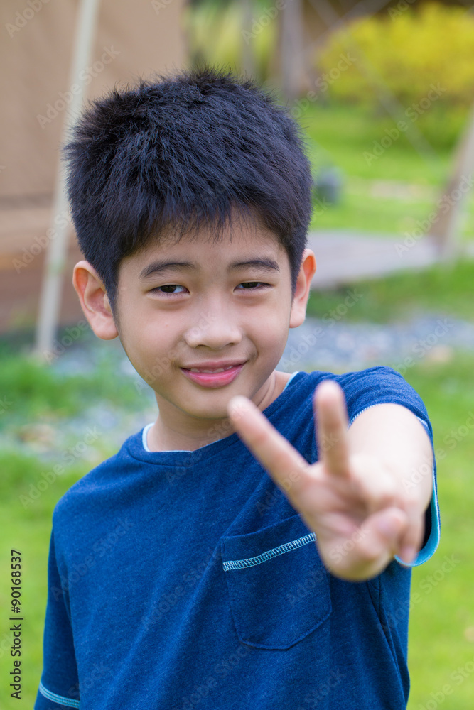 Asian Young Boy A Cute Asian Thai Young Boy With Thumb up Stock Photo Asian Young Boy A Cute Asian Thai Young Boy With Thumb up Stock Photo