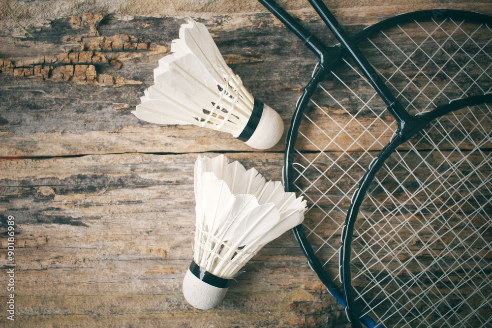 Shuttlecocks with badminton racket. Stock Photo | Adobe Stock
