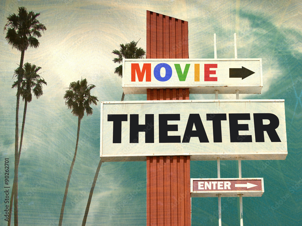 aged and worn vintage photo of movie theater sign with palm trees Stock ...