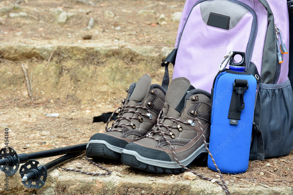 hiking boots and backpack Stock 写真 | Adobe Stock