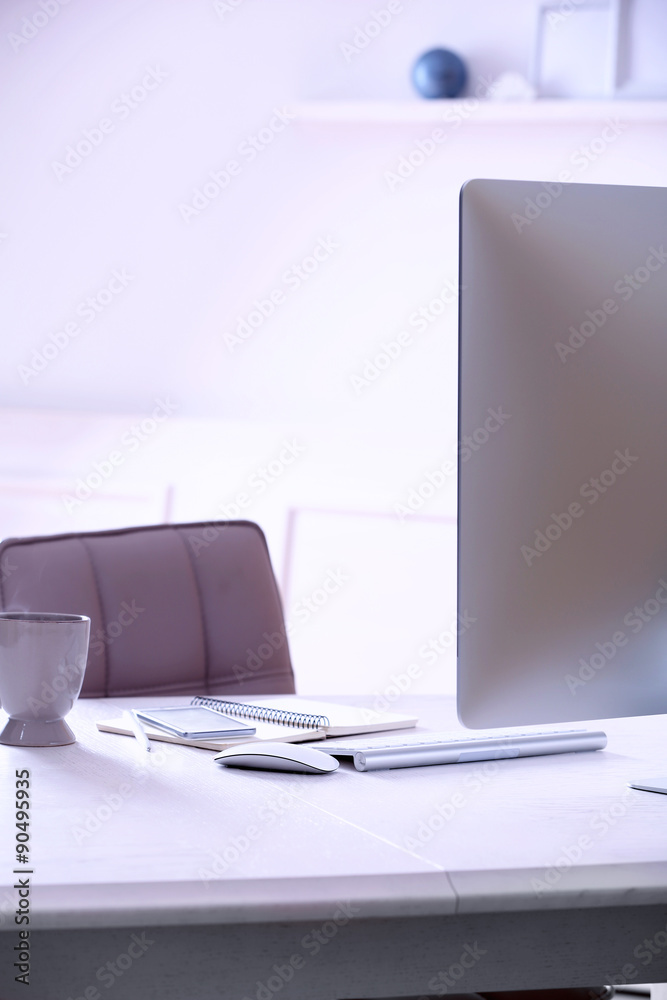 Workplace with computer in room Stock Photo | Adobe Stock