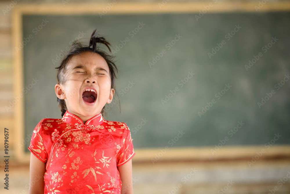 Little girl on red chinese dress Stock Photo | Adobe Stock
