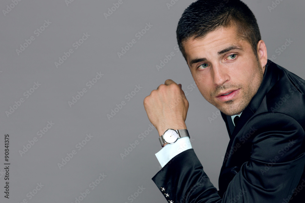 handsome young man wears a watch Stock Photo | Adobe Stock