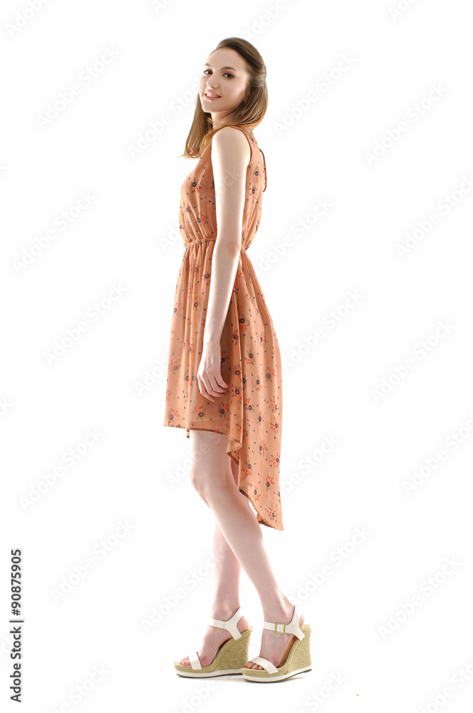 Full length side view young fashion model posing on white background ...