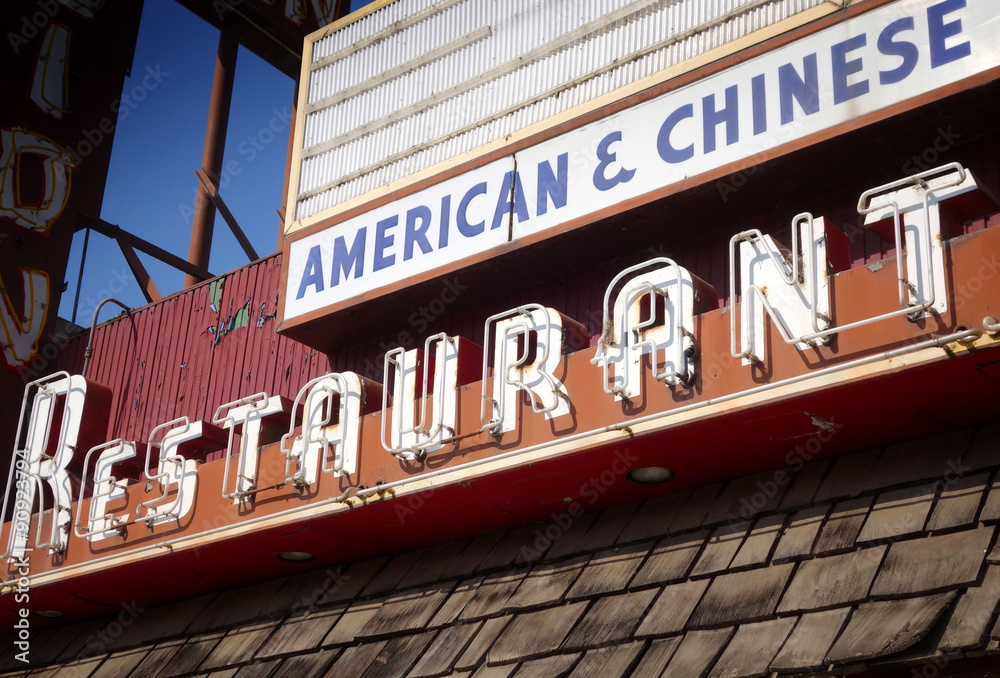 aged and worn vintage photo of old neon restaurant sign Stock Photo ...