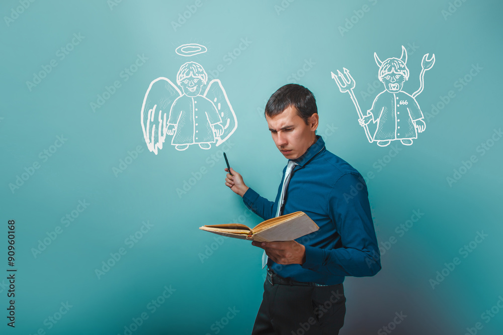 man holding a book showing an angel and devil demon infographics Stock ...