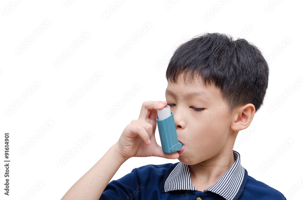 Asian boy using inhaler for asthma over white background Stock Photo ...