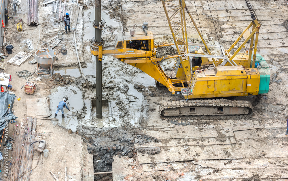 hydraulic drilling machines and workers on construction site Stock ...