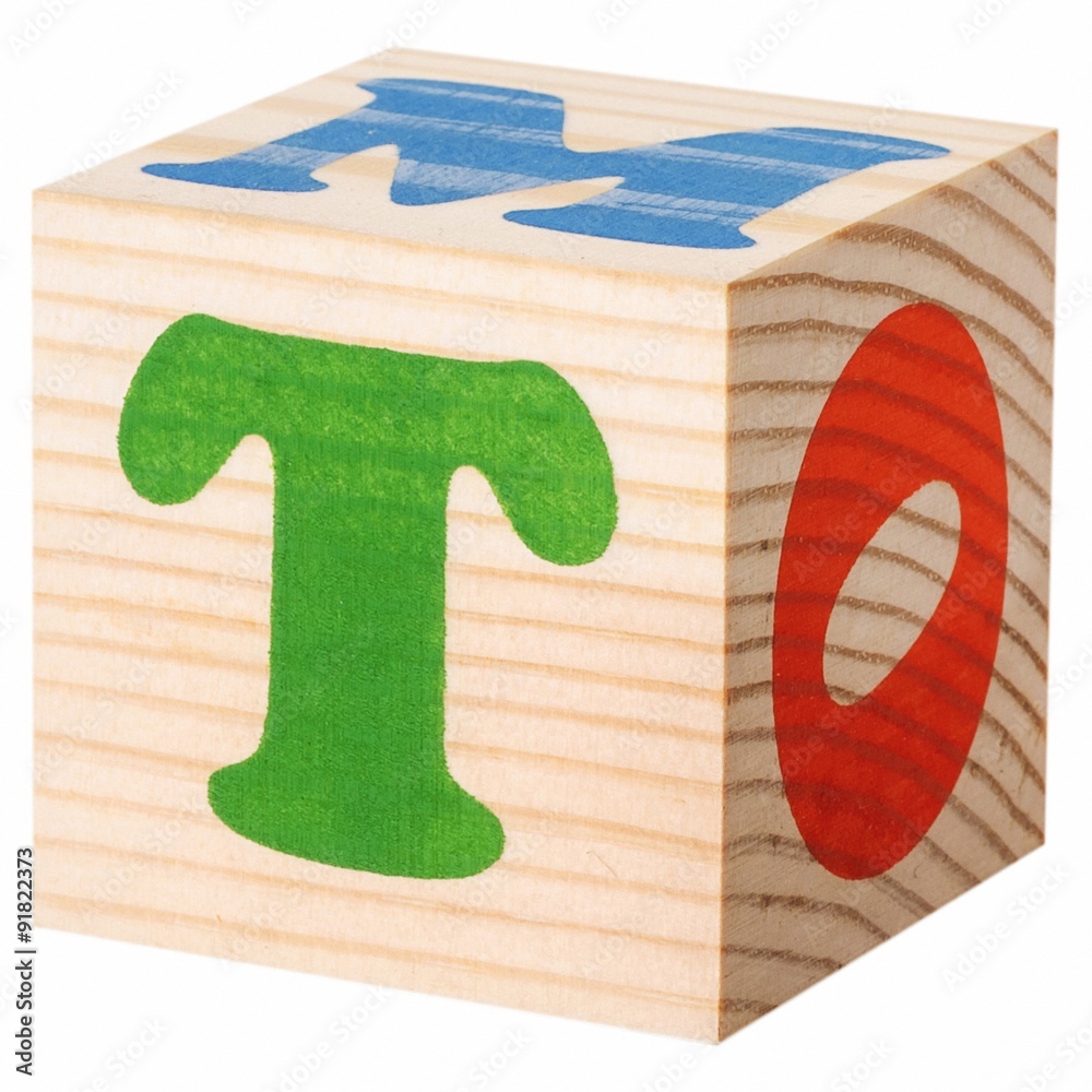 The letter T. wooden blocks with letters of the English alphabet ...