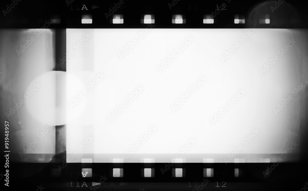 retro color film strip with spotlight background and texture Stock ...