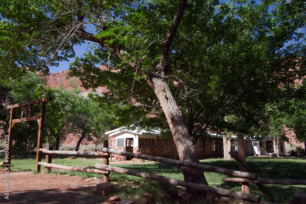 Main house and gate in Lonely Dell Ranch National Historic District at ...