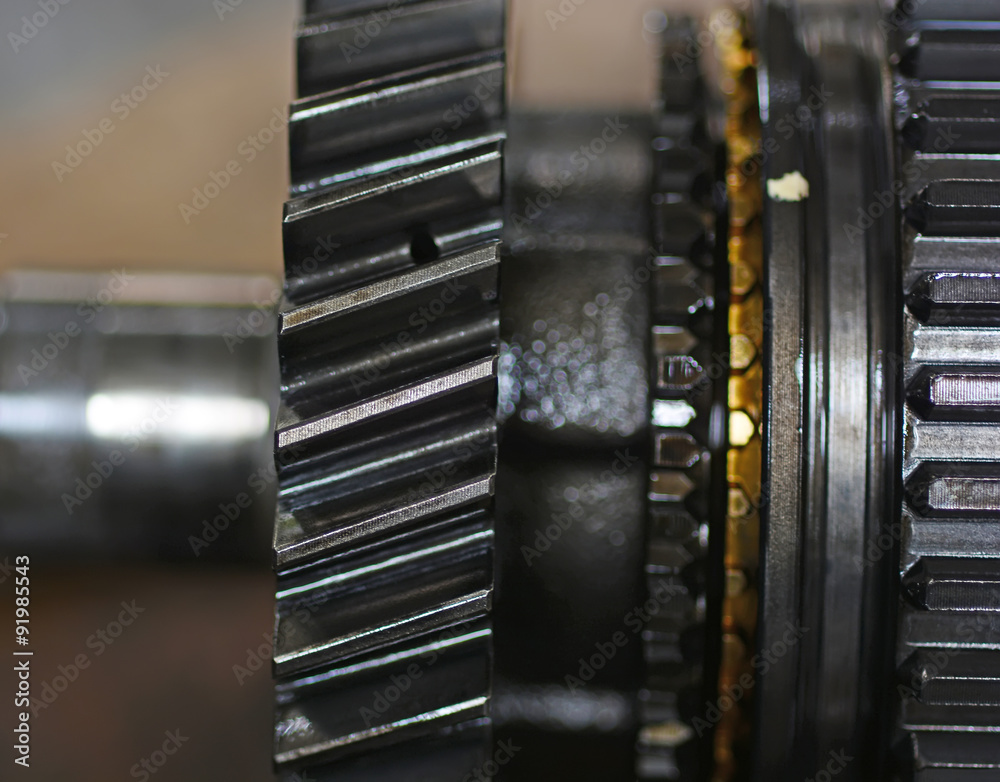 Large cog wheels in the motor. Stock Photo | Adobe Stock