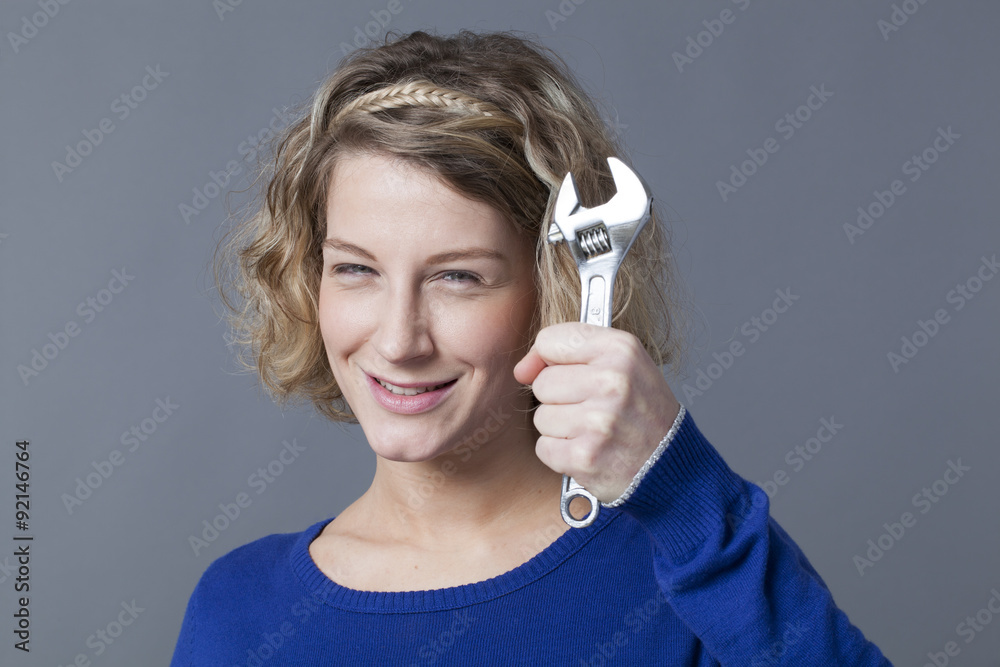 happy mechanics girl holding spanner for fun automotive fixing foto de ...
