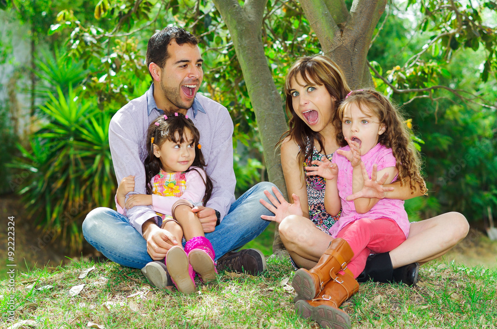 Hispanic Family Playing Outside
