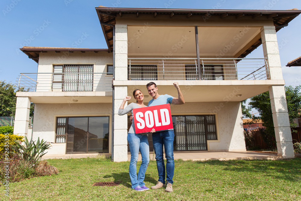 couple standing outside their house Stock Photo | Adobe Stock