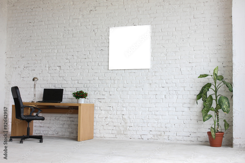 an interesting example of an office interior, against the wall of white ...
