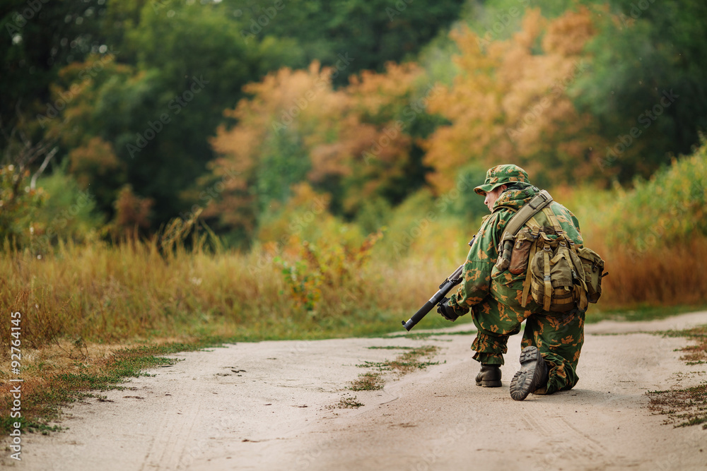 russian soldier in the battlefield with a rifle Stock Photo | Adobe Stock