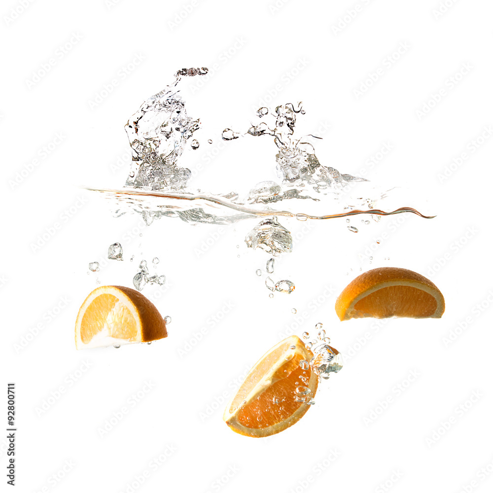 Orange splash on water, isolated on white background Stock Photo ...