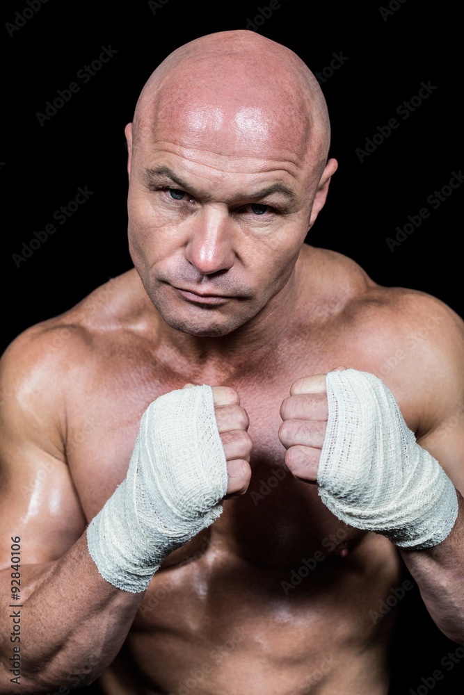 Portrait of bald fighter with bandage Stock Photo | Adobe Stock