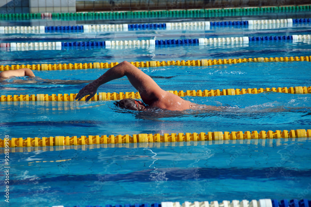 swimmer in swimming pool Stock Photo | Adobe Stock