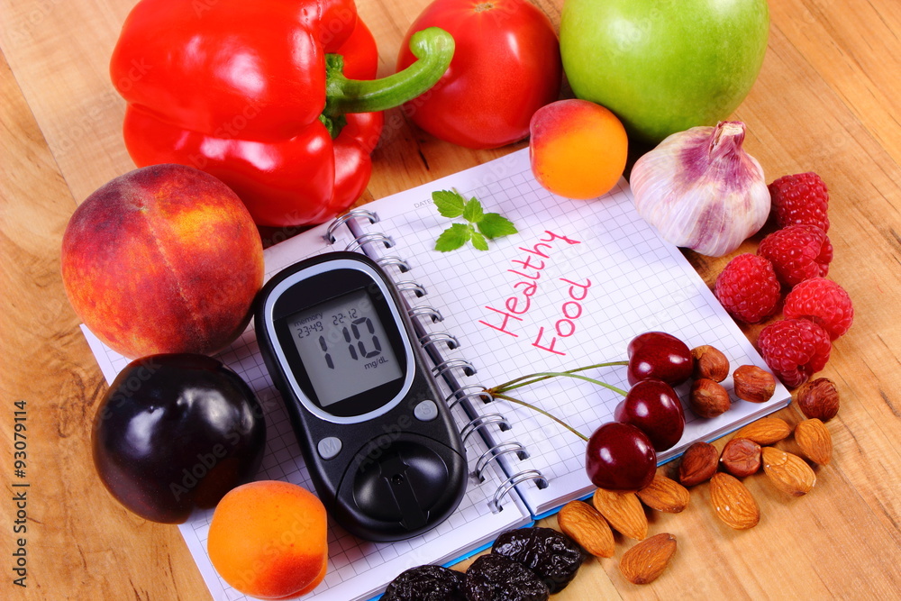 Fruits and vegetables with glucometer and notebook for notes, healthy ...