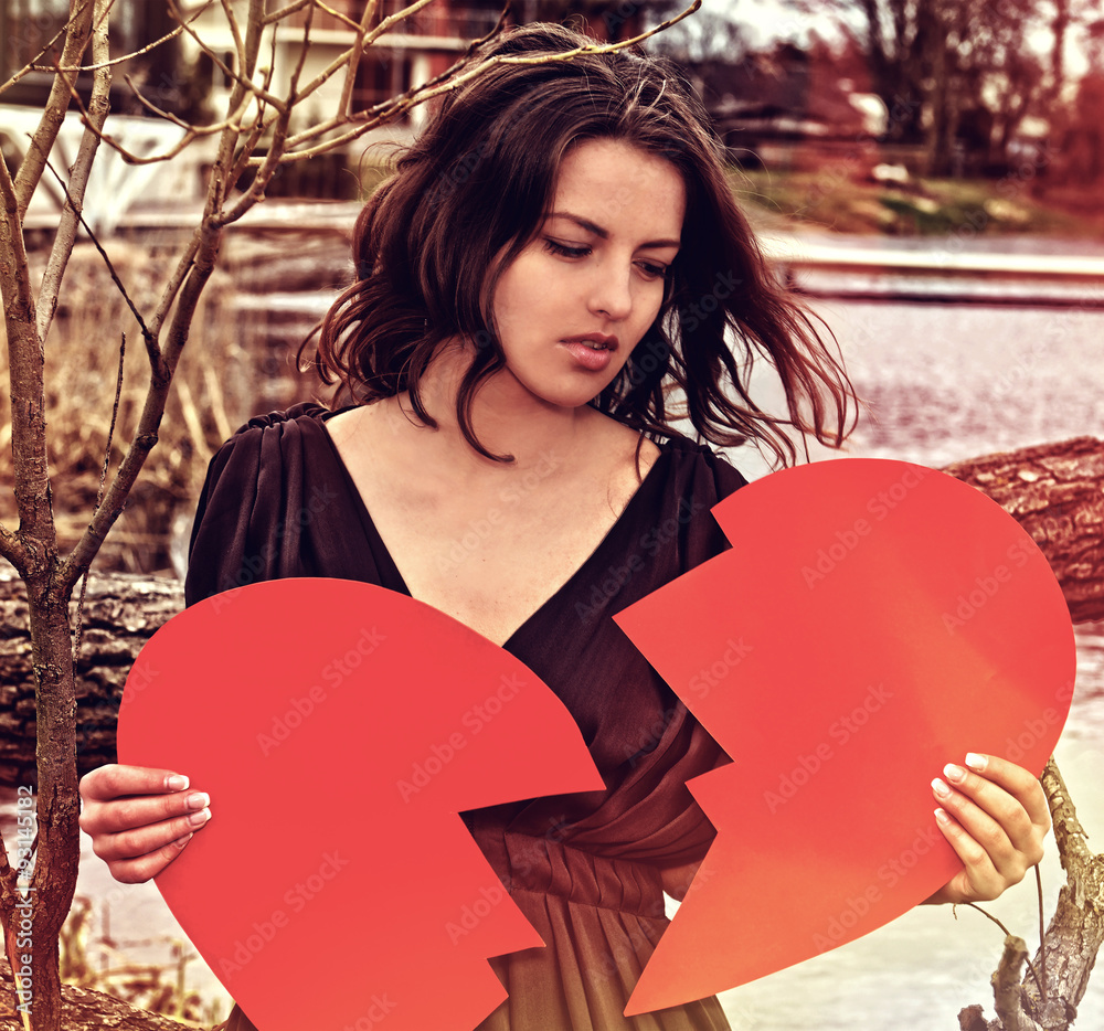 The sad woman with the broken heart Stock Photo | Adobe Stock