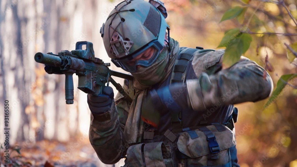 The player is shooting airsoft Stock Video | Adobe Stock