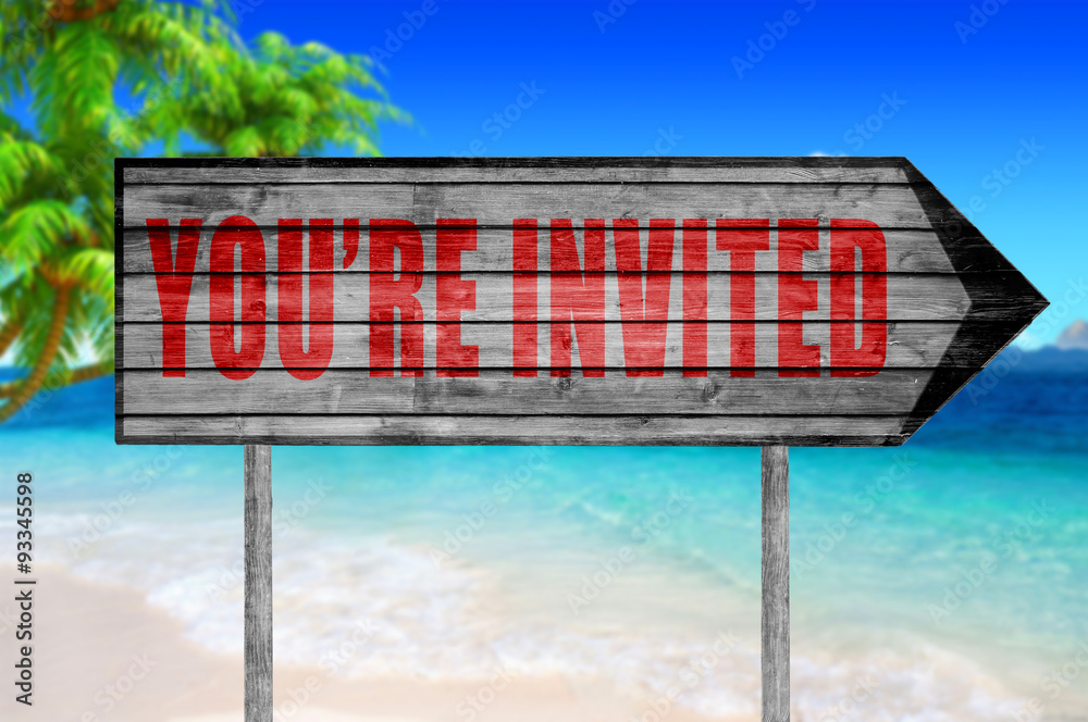 Red You're Invited! wooden sign with a beach on background Stock Photo ...