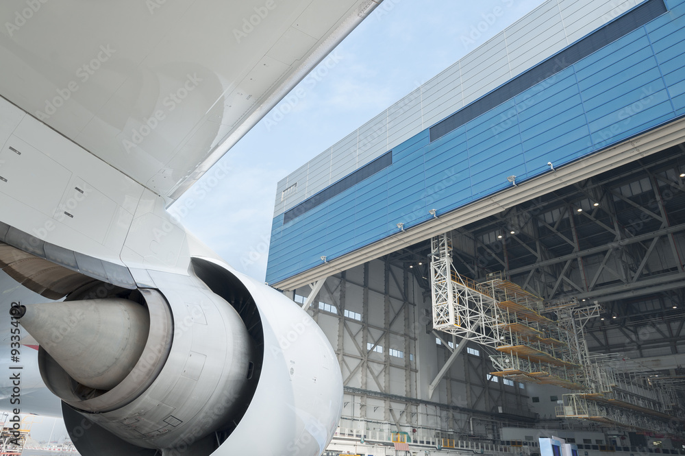 Jet engine and aircraft hangar Stock Photo | Adobe Stock