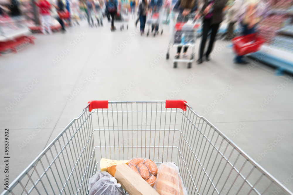 Shopping cart in supermarket Stock Photo | Adobe Stock
