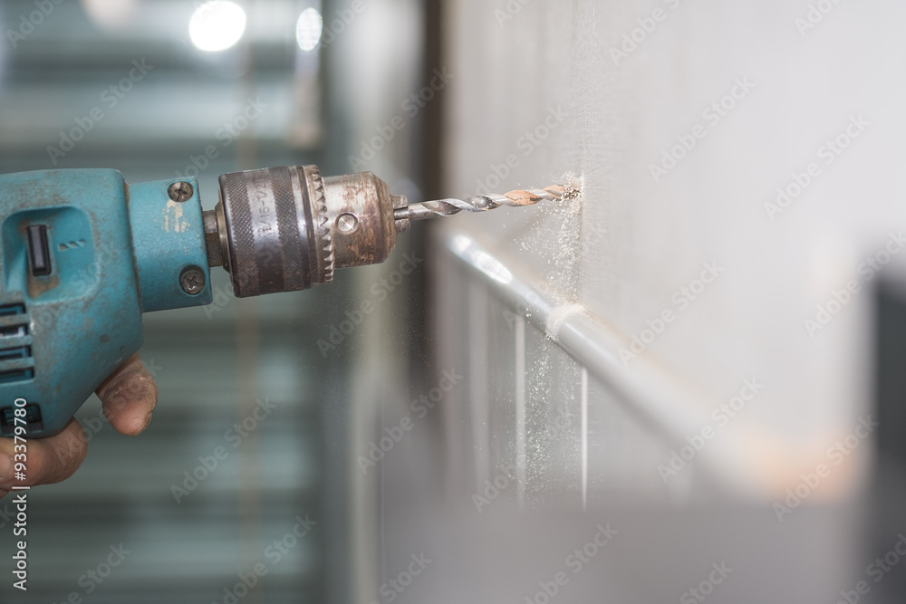 hands hold electric drill in room , interior design and home ren Photos ...