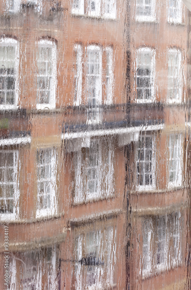 Rainy Day, Urban Living. Being stuck inside on a rainy day, looking at ...