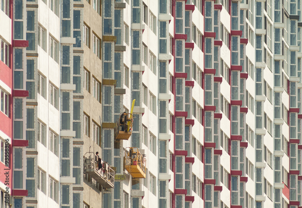 insulation and cladding of the facade of high-rise apartment building ...