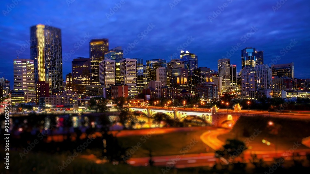 Night shot of downtown Calgary, time lapse, business names are blurred ...