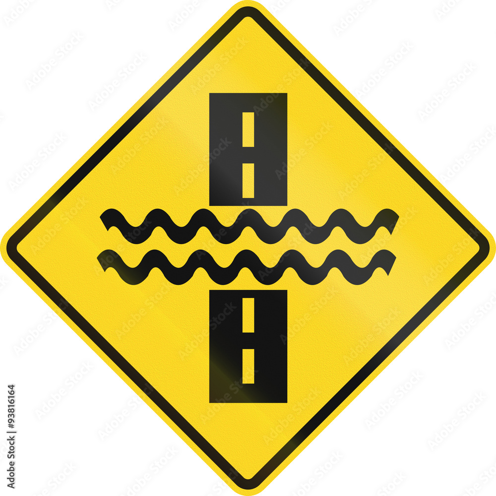 Warning road sign in Canada - Water on road. This sign is used in ...