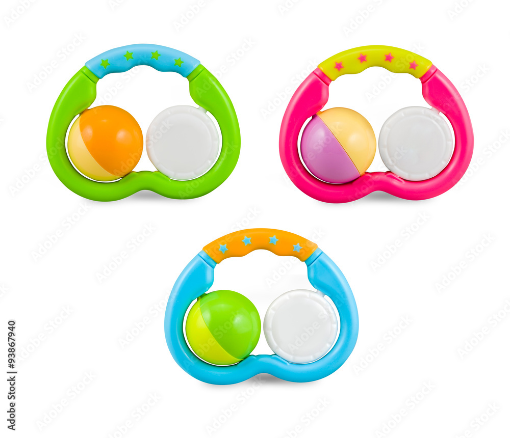 Three colorfull baby rattle - isolated on white Stock Photo | Adobe Stock