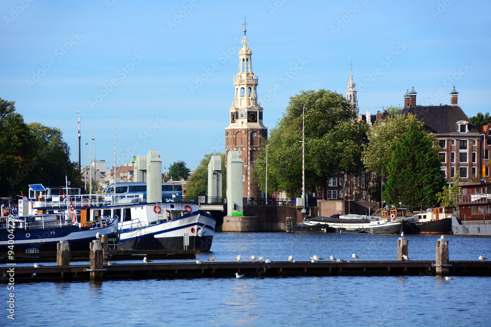 Gracht in Amsterdam mit Montelbaanstoren als Turm Stock Photo | Adobe Stock
