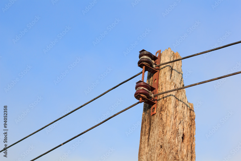 Power line conductor on old wooden pole Stock Photo | Adobe Stock