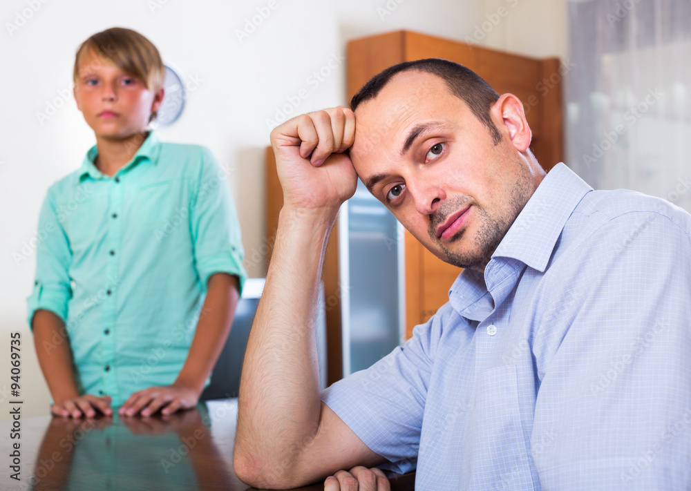 Father after argue with teenage son Stock Photo | Adobe Stock
