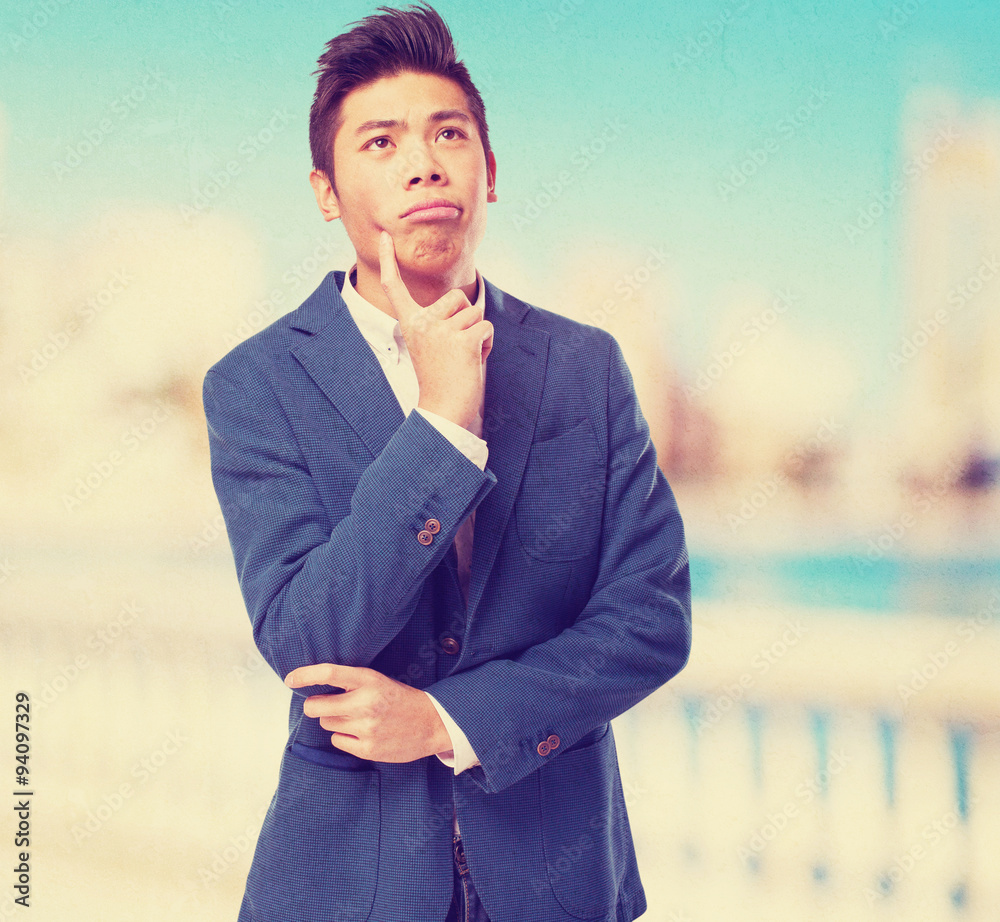 chinese man thinking Stock Photo | Adobe Stock