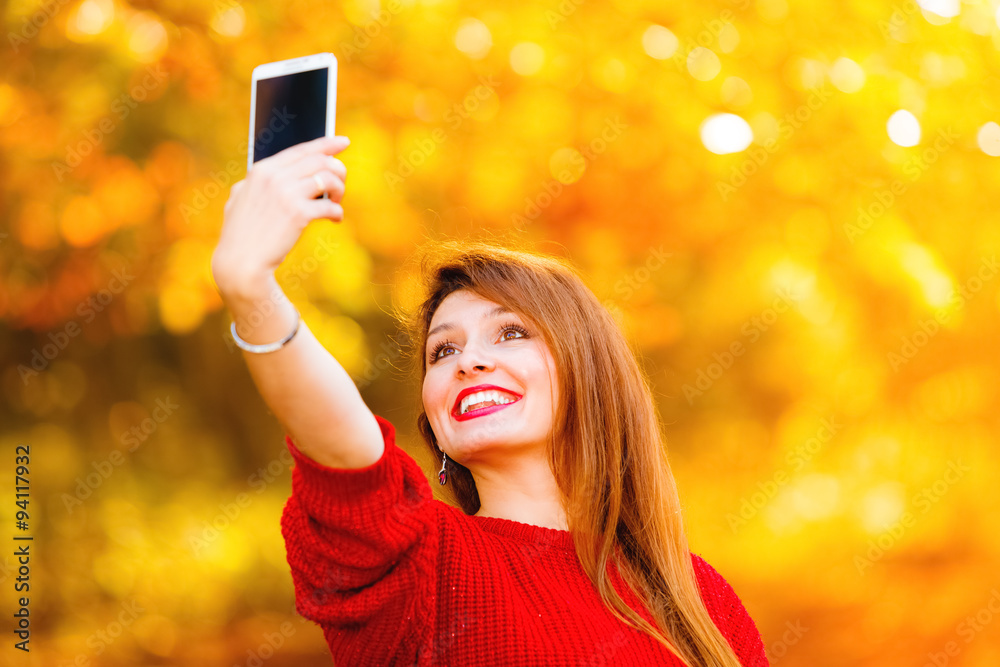 girl taking self picture selfie with smartphone camera outdoors Stock ...