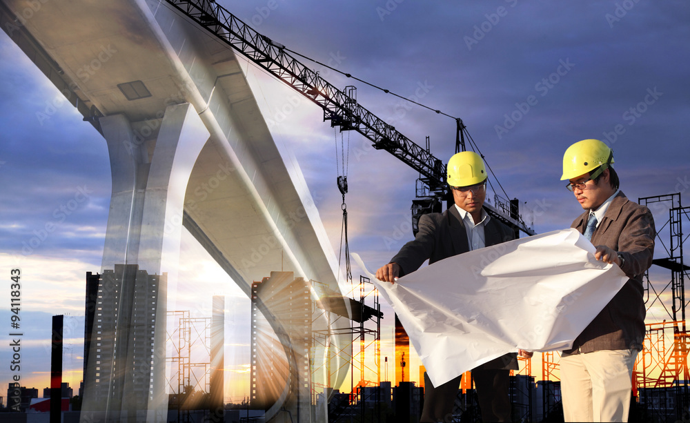 Double exposure of engineering man standing with sunset scene and ...