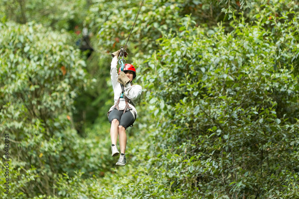 Experience the thrill of flying through the jungle canopy on a zipline ...