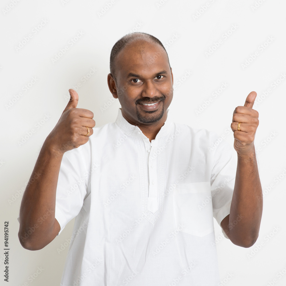 Mature casual business Indian man thumbs up Stock Photo | Adobe Stock