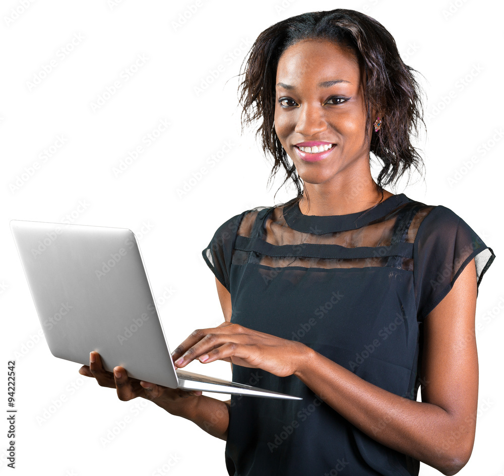 black woman holding a laptop Stock Photo | Adobe Stock