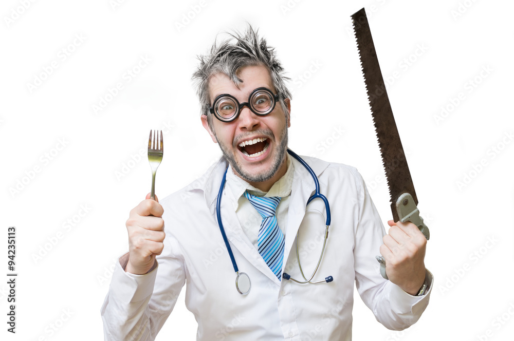 Funny and crazy doctor is laughing and holds saw in hand on whit Stock ...