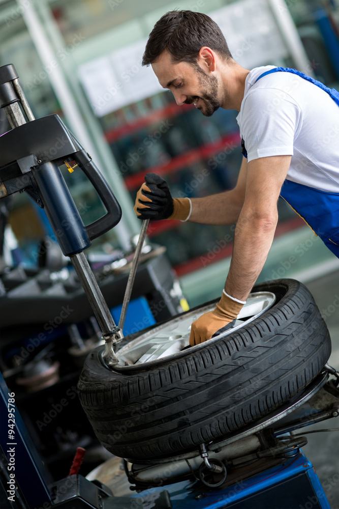 Engineer diagnostics tyre Stock Photo | Adobe Stock