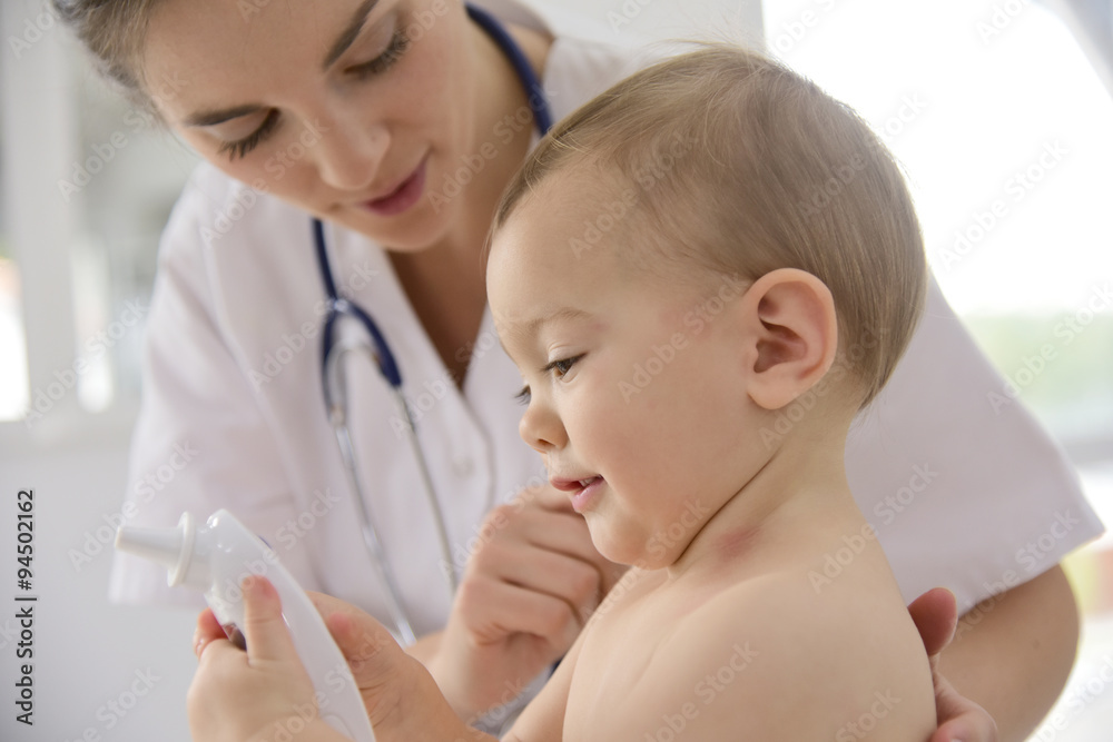 Baby in doctor's office for medical checkup Stock Photo | Adobe Stock